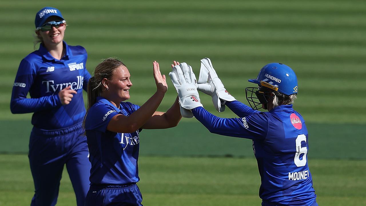 Danielle Gibson knocks over the stumps