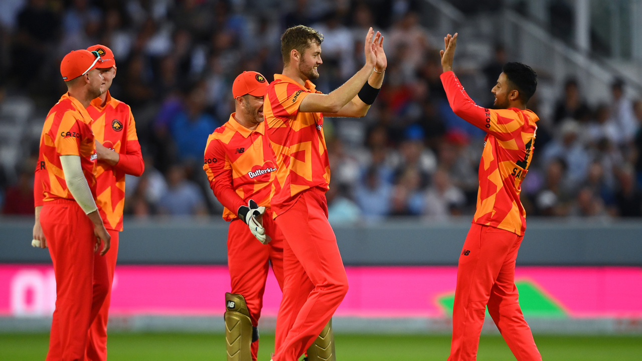 Tom Helm bowls Adam Rossington